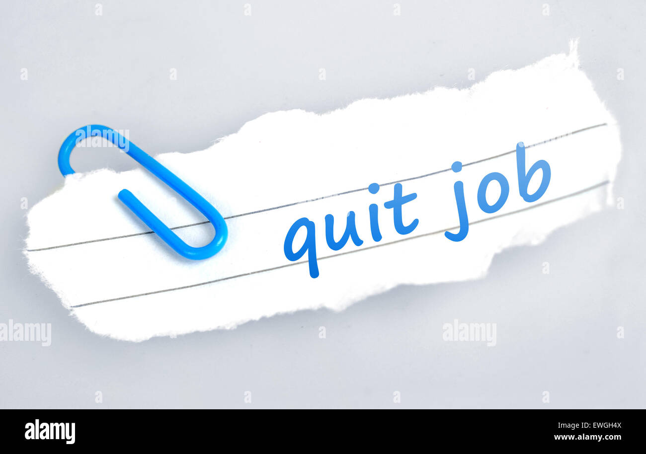 Quit job word on grey background Stock Photo - Alamy