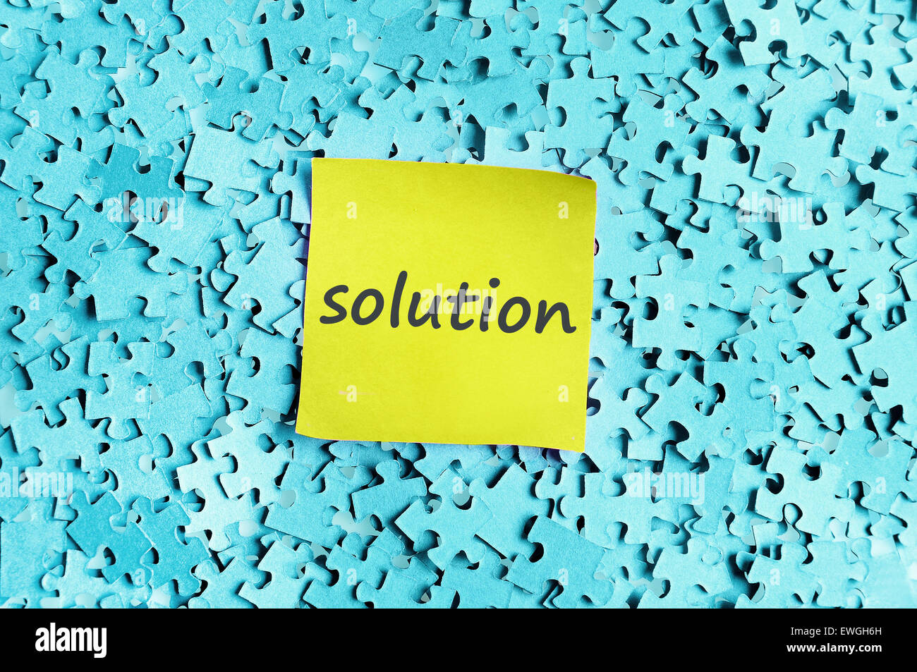 Solution word on puzzle background Stock Photo - Alamy
