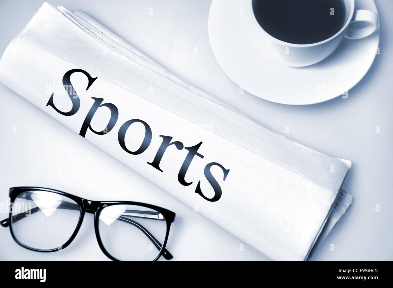 Sports word on newspaper Stock Photo - Alamy