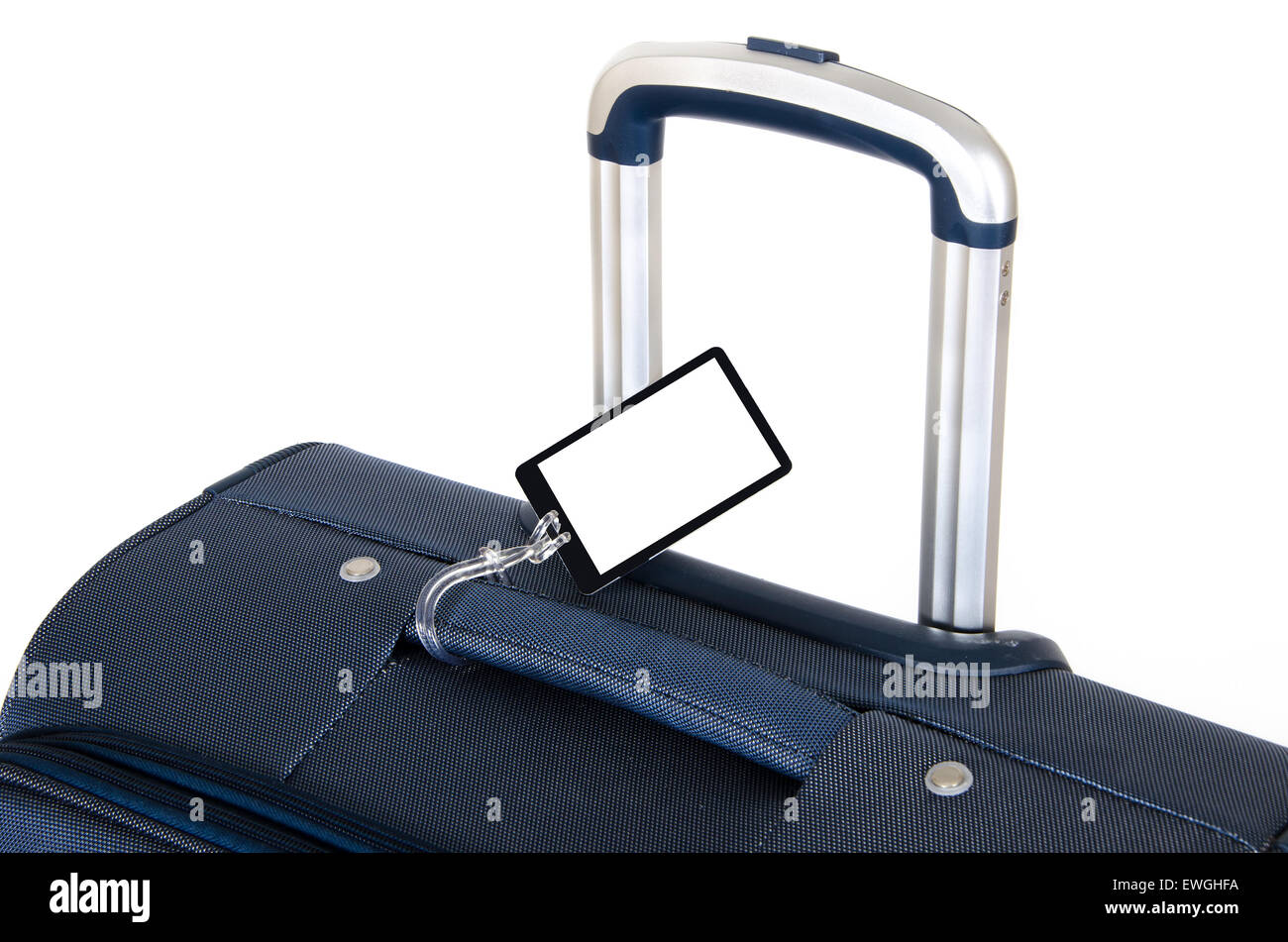 Travel suitcase close up with blank tag isolated on white background ...
