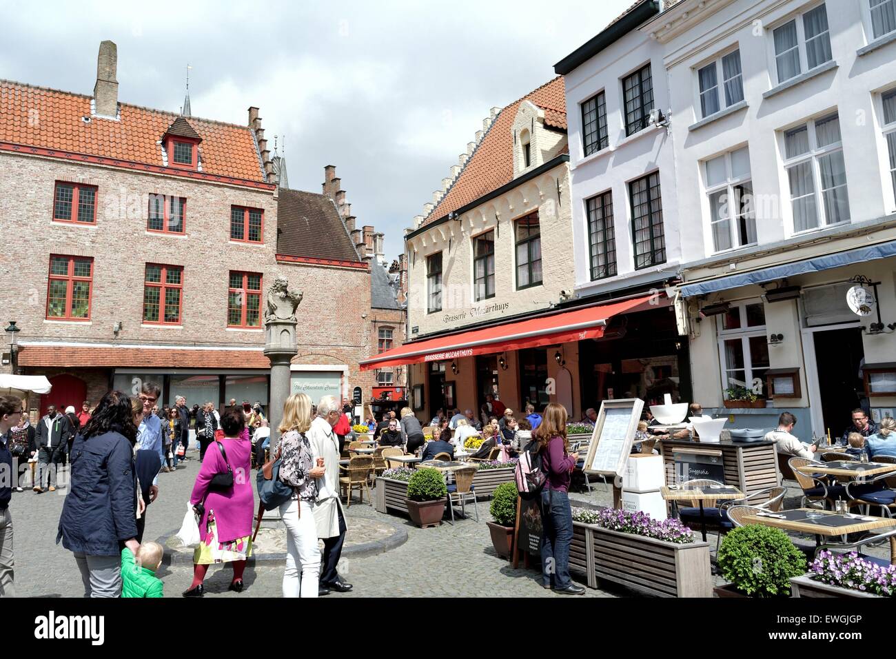 Crowded square in centre of Bruges Belgium Stock Photo - Alamy
