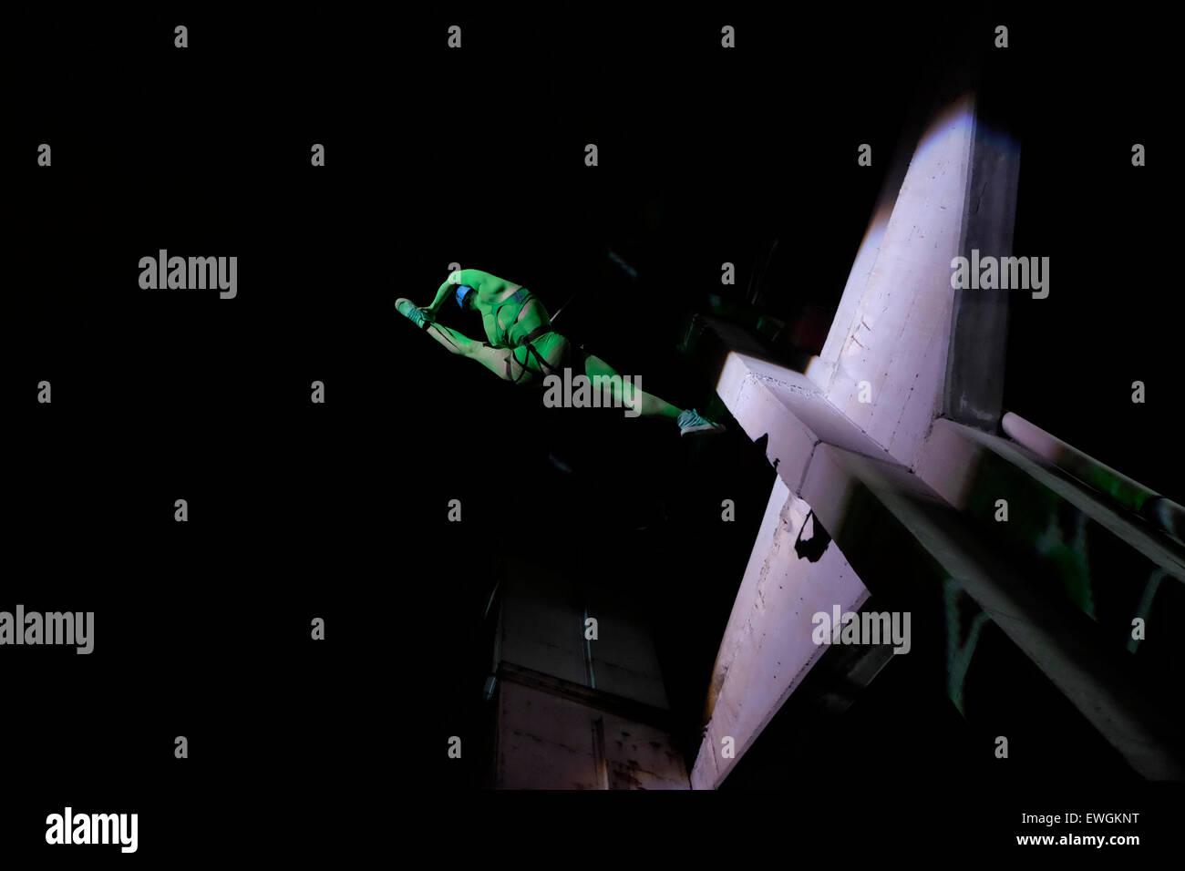 An acrobat performing on a rope during the 'White Night' event in Tel ...