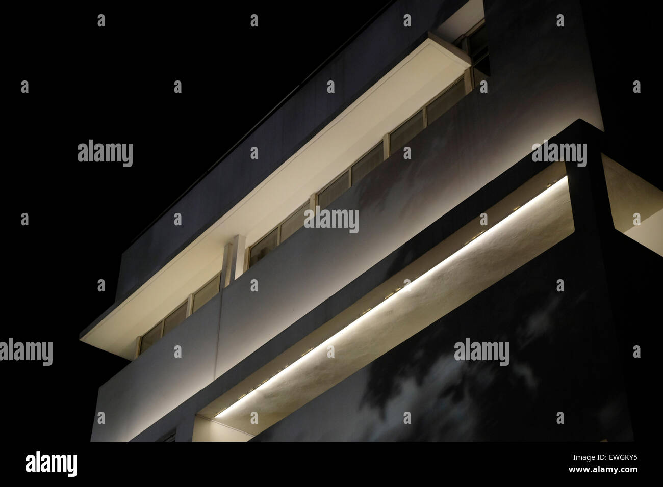 Protruding streamline balcony and a thin curved concrete shade of a ...