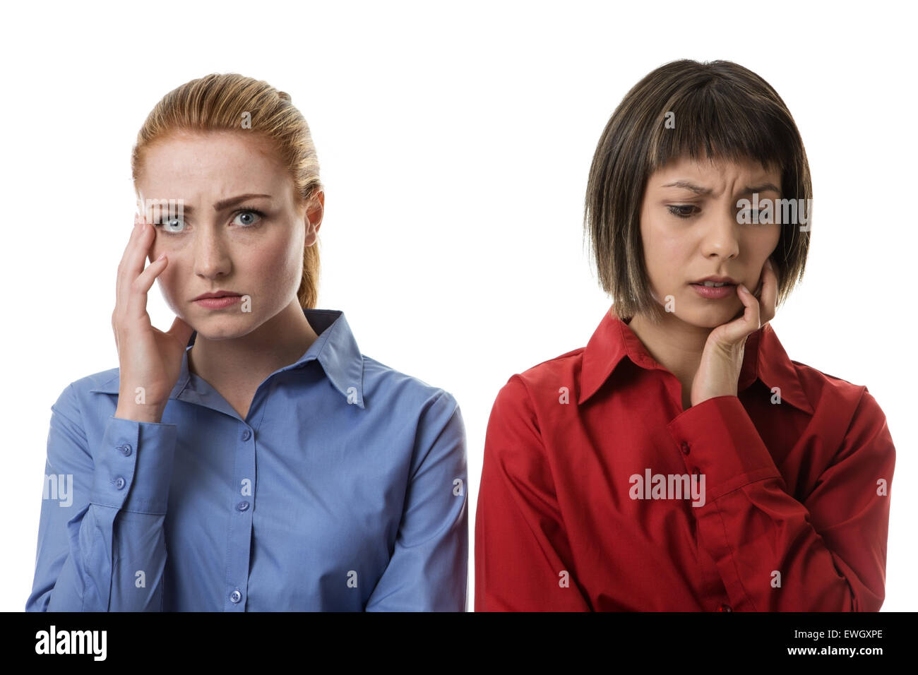 two business woman with different face expressions sanding side by side ...