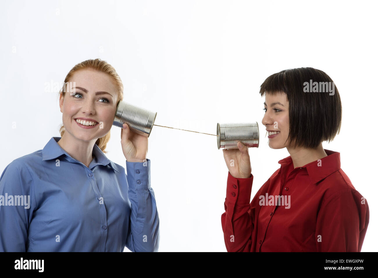 two business people using tin cans to communicate with each other Stock ...
