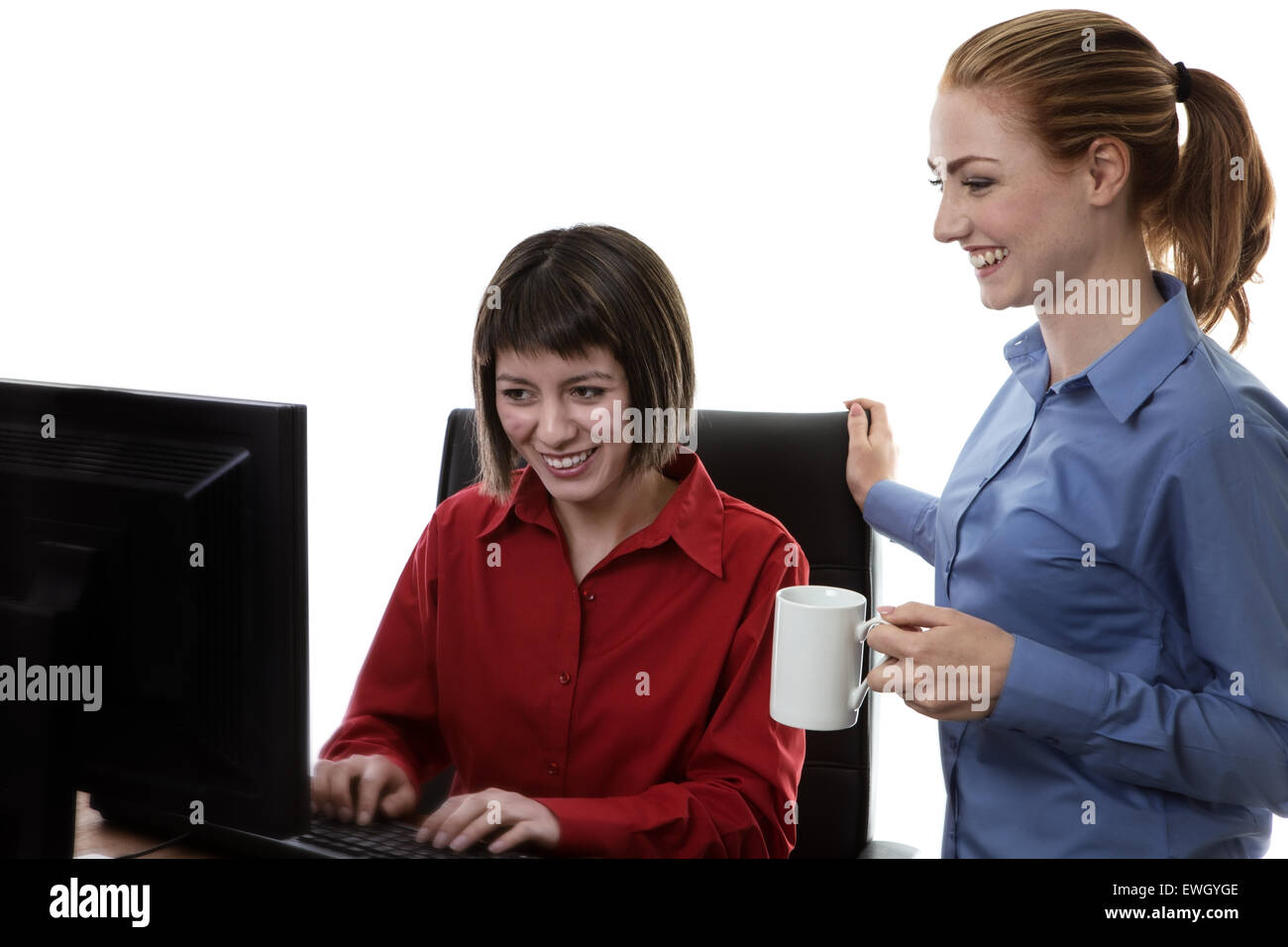 two work colleagues working together in the office Stock Photo - Alamy