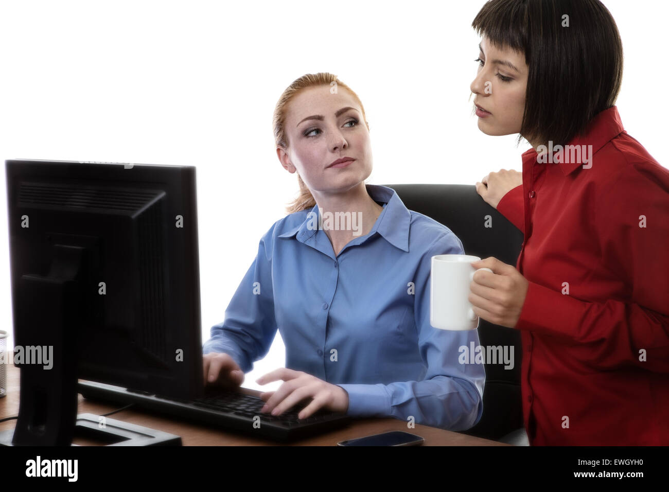 two work colleagues working together in the office Stock Photo - Alamy