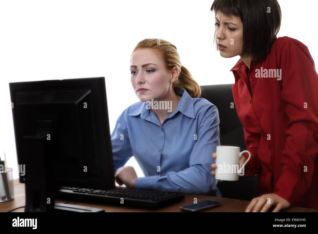 two work colleagues working together in the office Stock Photo - Alamy