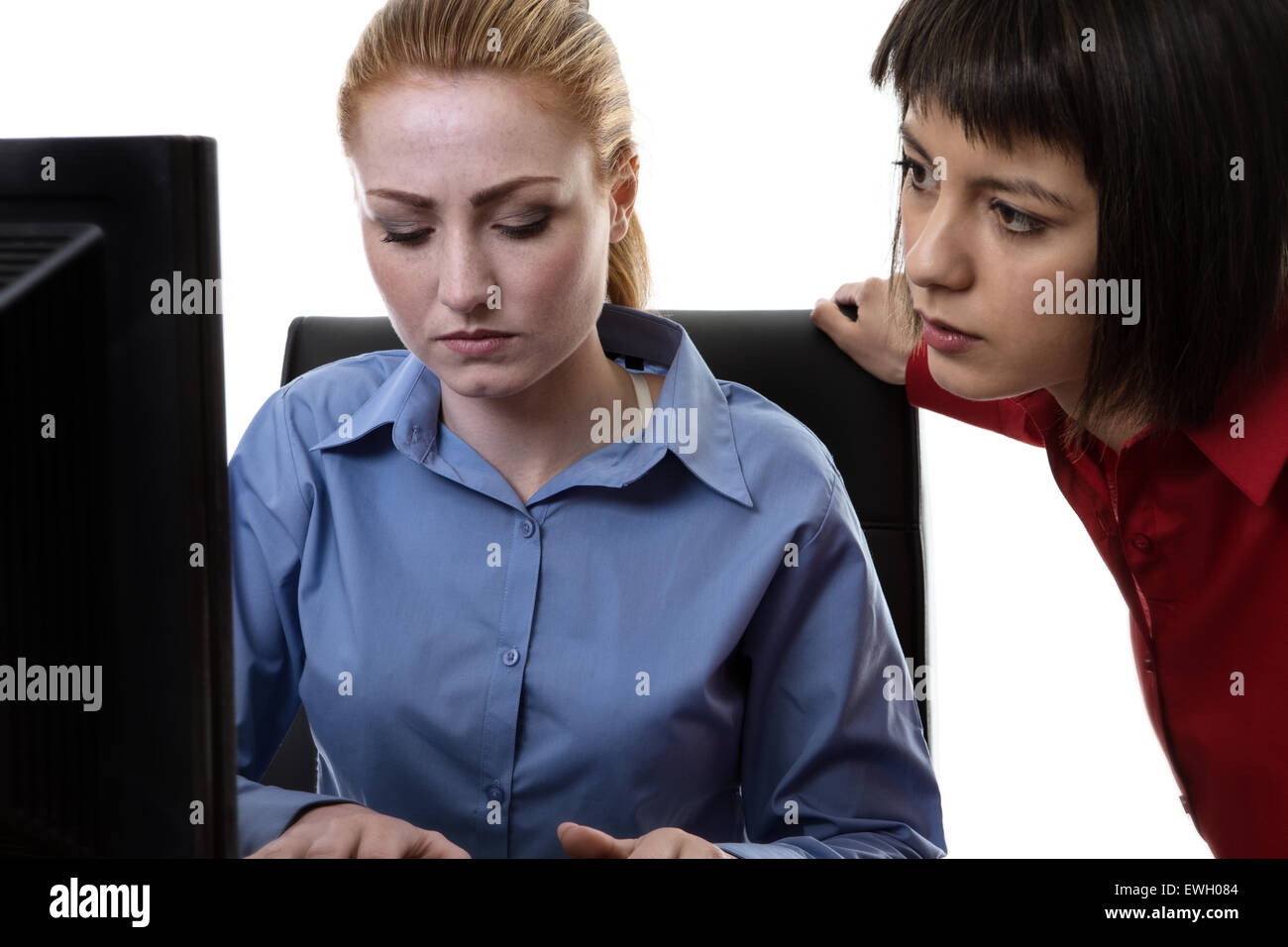 two work colleagues working together in the office Stock Photo - Alamy