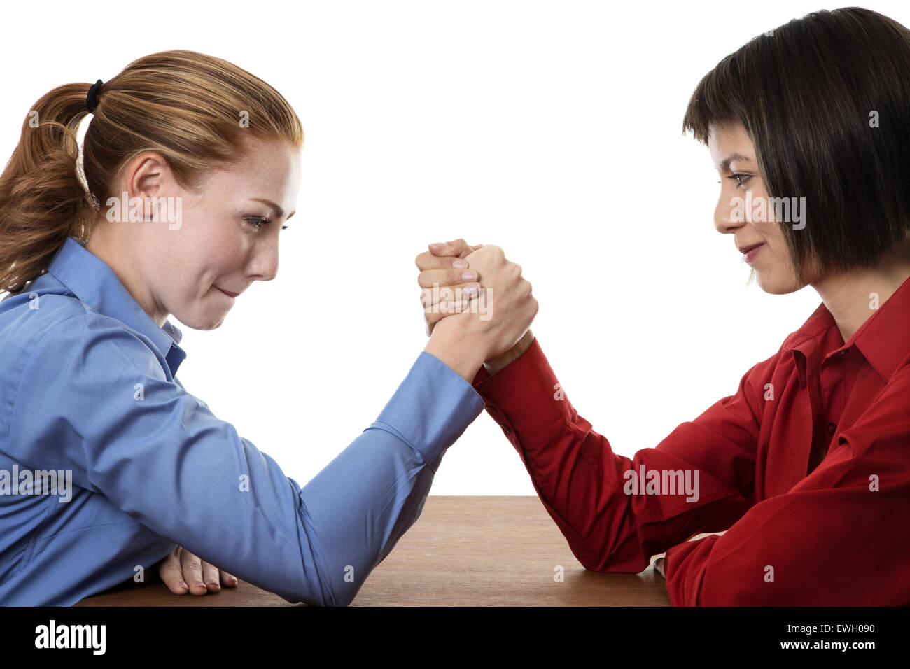Two women arm wrestling hi-res stock photography and images - Alamy
