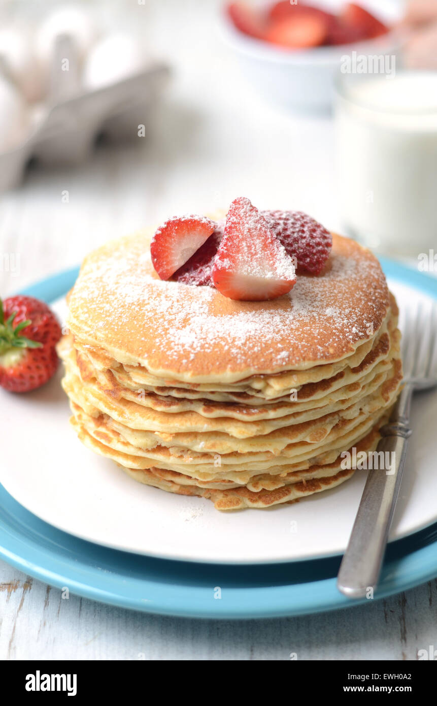 stack of freshly prepared traditional pancakes with strawberries Stock ...