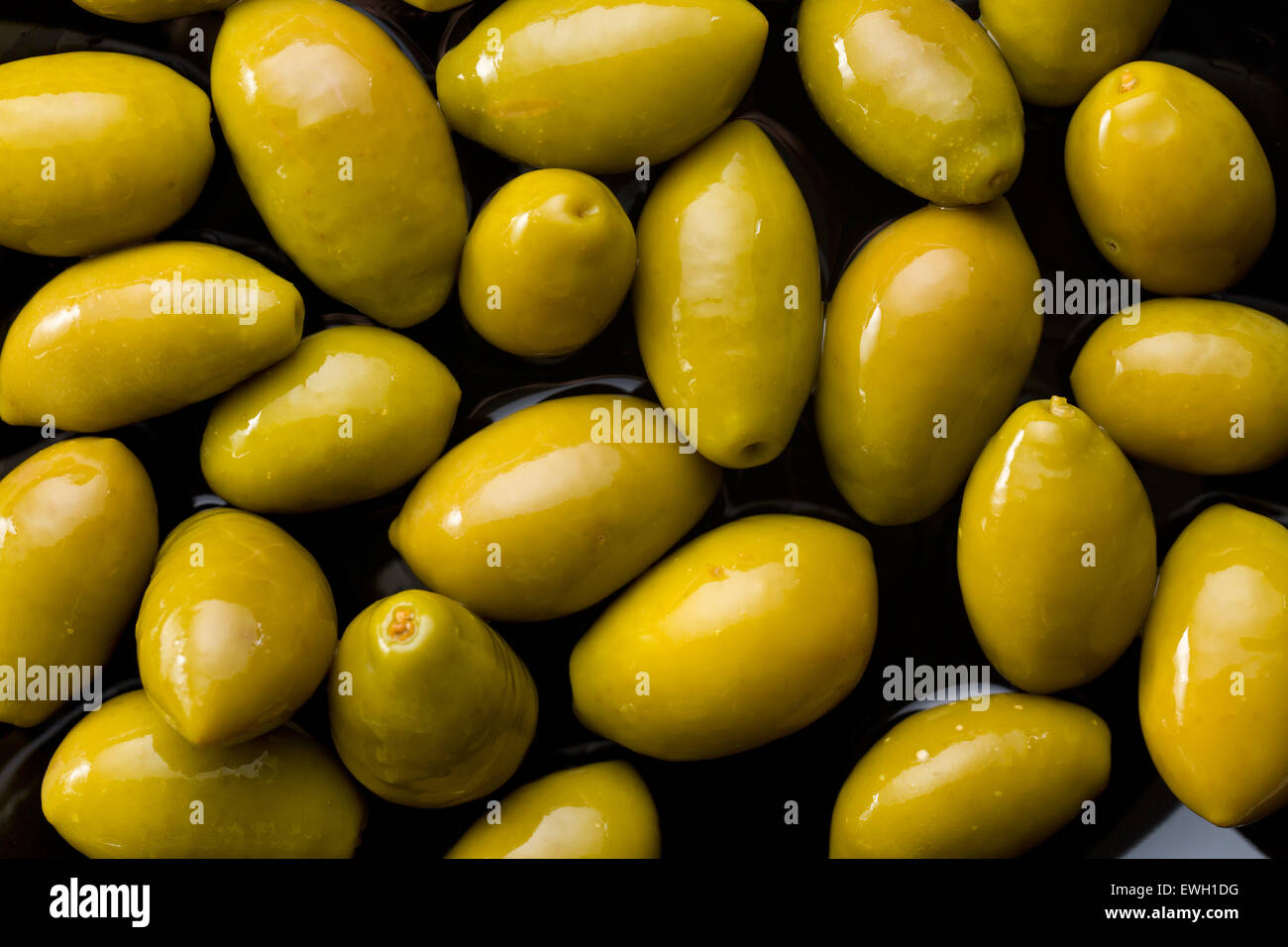 top view of green olives Stock Photo - Alamy