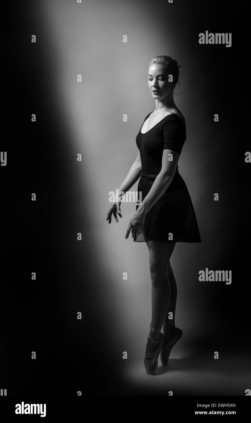 Black and white image of single ballerina high key image shot in the ...