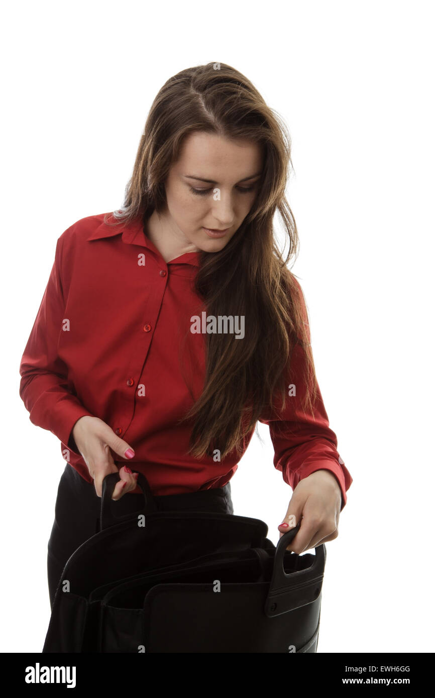 working woman looking inside her briefcase Stock Photo - Alamy