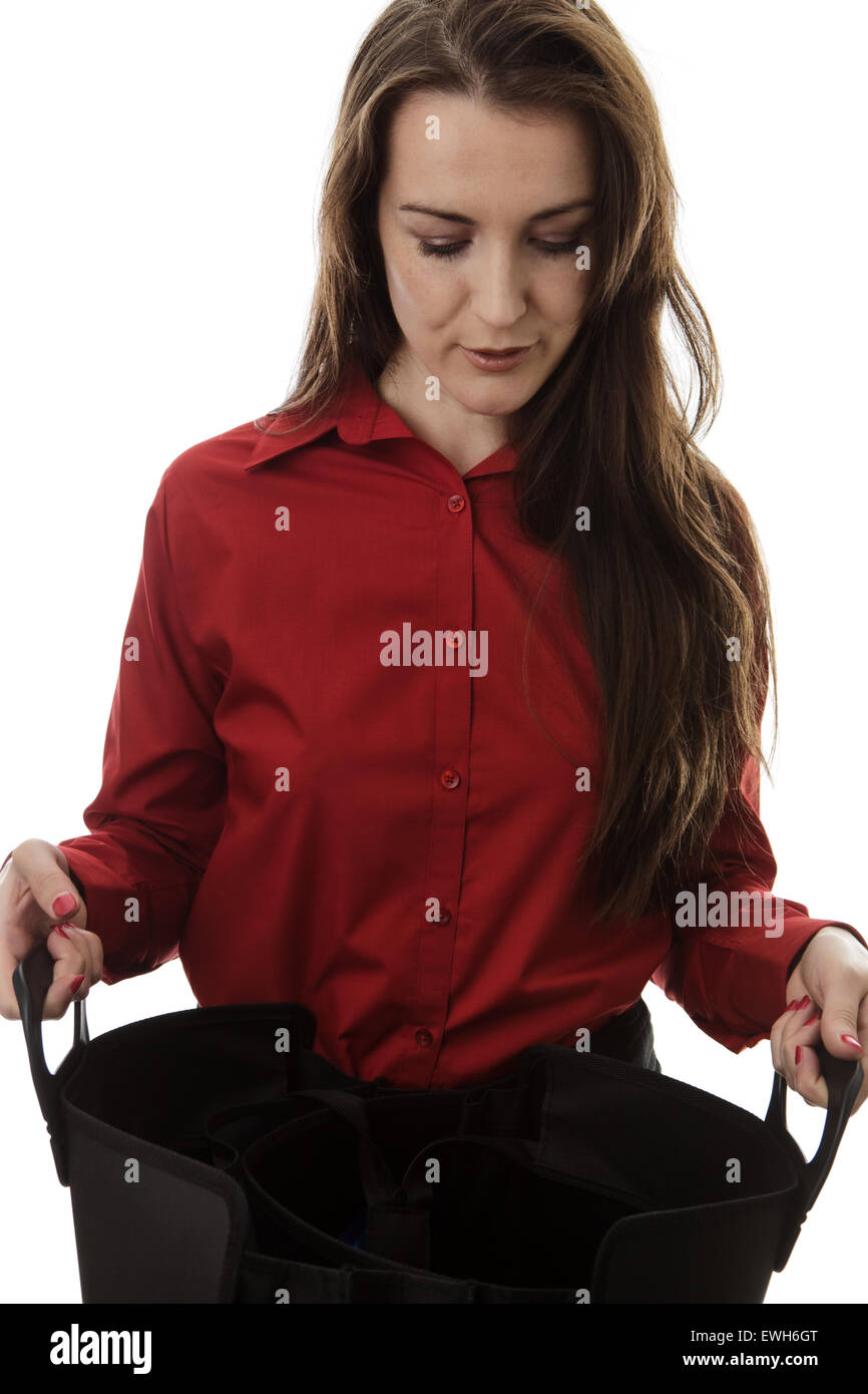 working woman looking inside her briefcase Stock Photo - Alamy