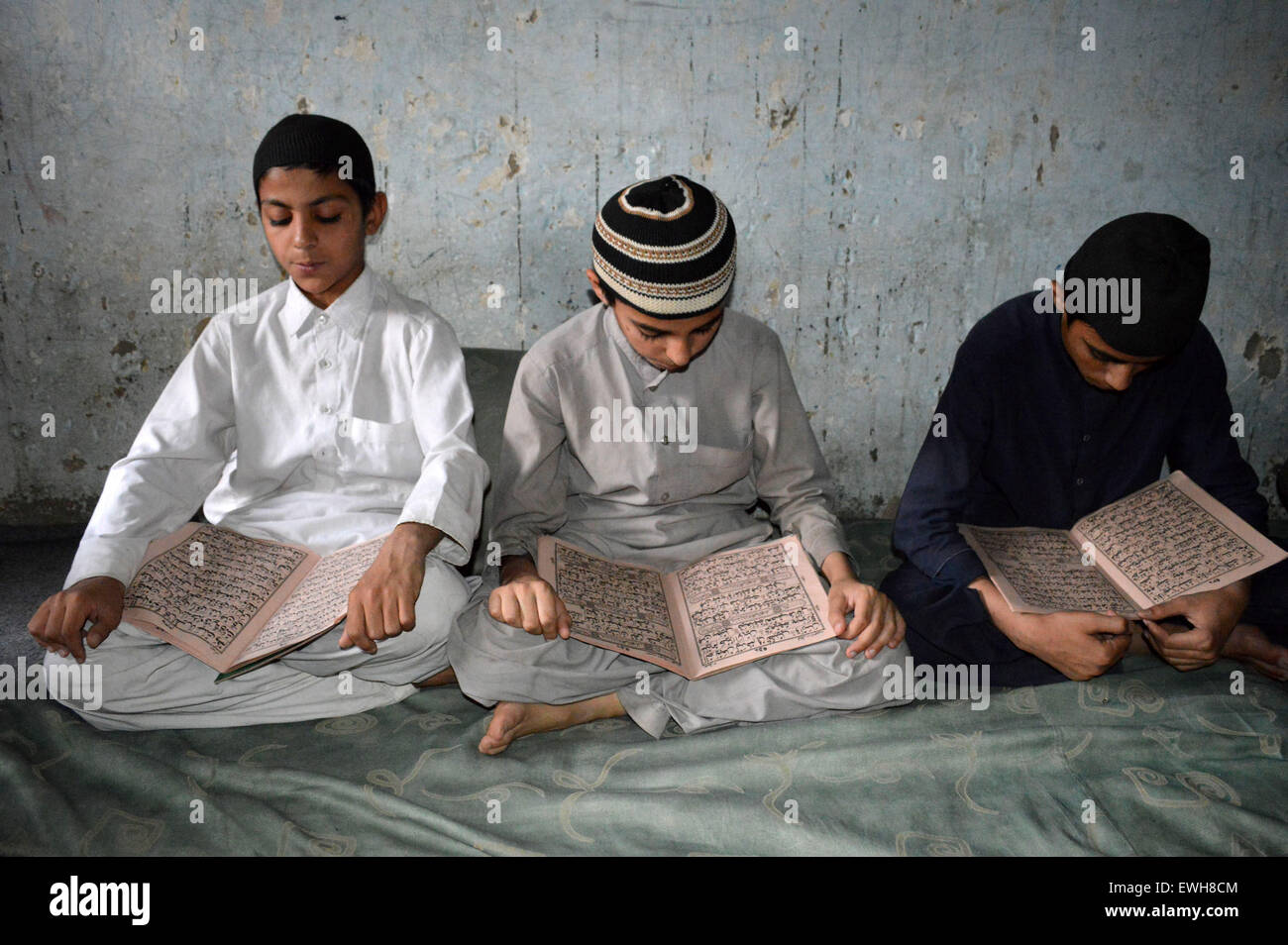 Quran holy book muslims in hi-res stock photography and images - Alamy