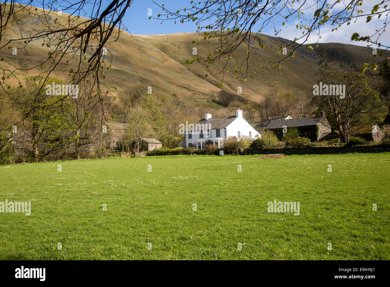 Traditional stone farmhouse at Howtown, Ullswater, Cumbria, England, UK ...