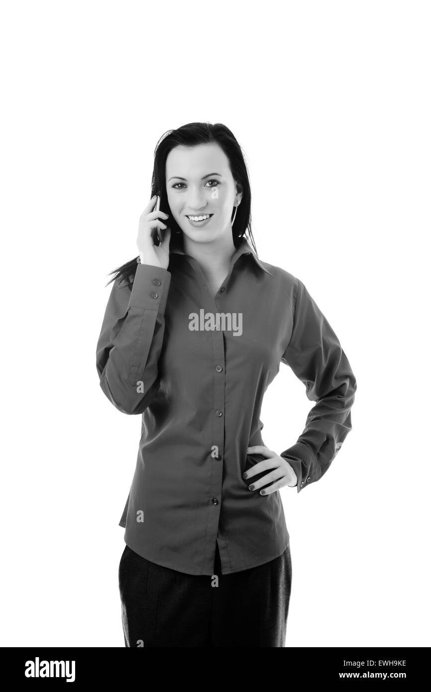 standing woman on a mobile phone Stock Photo - Alamy