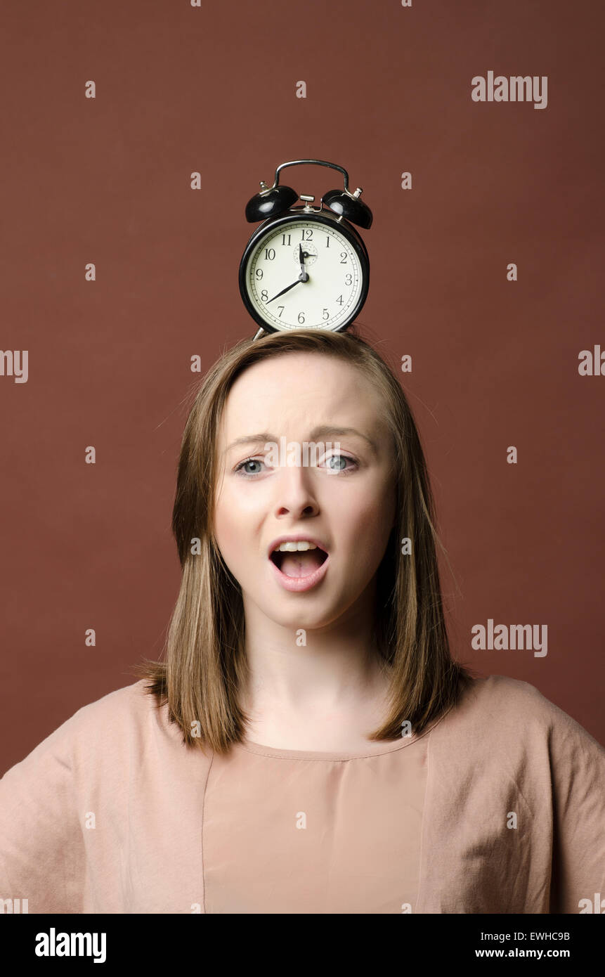 Woman under time pressure Stock Photo - Alamy
