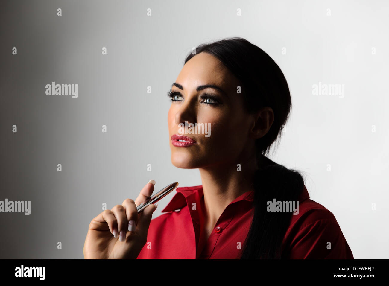 high key portrait of a beautiful women thinking Stock Photo - Alamy