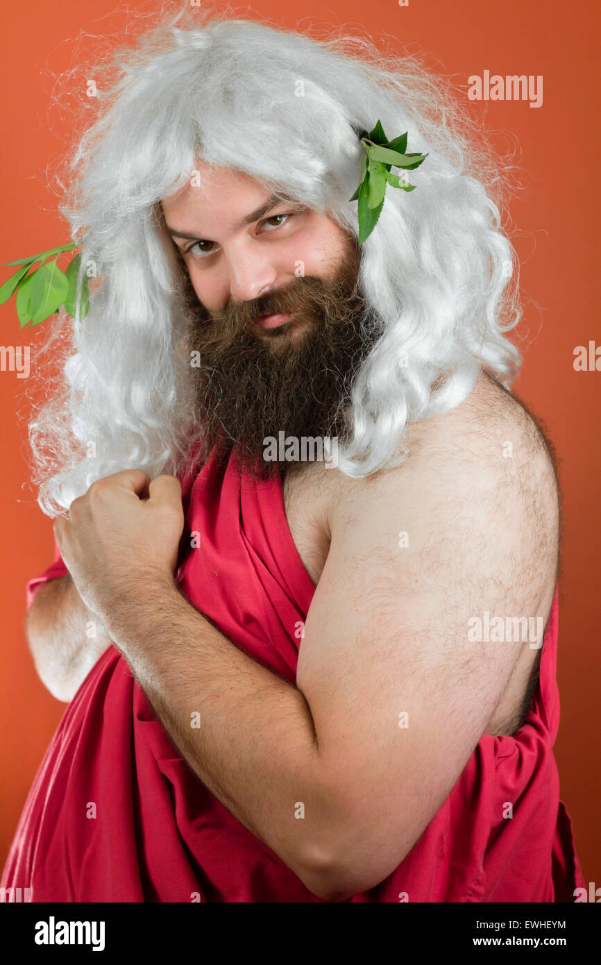 Loving zeus god or jupiter clutches his hands to his heart and blushes ...