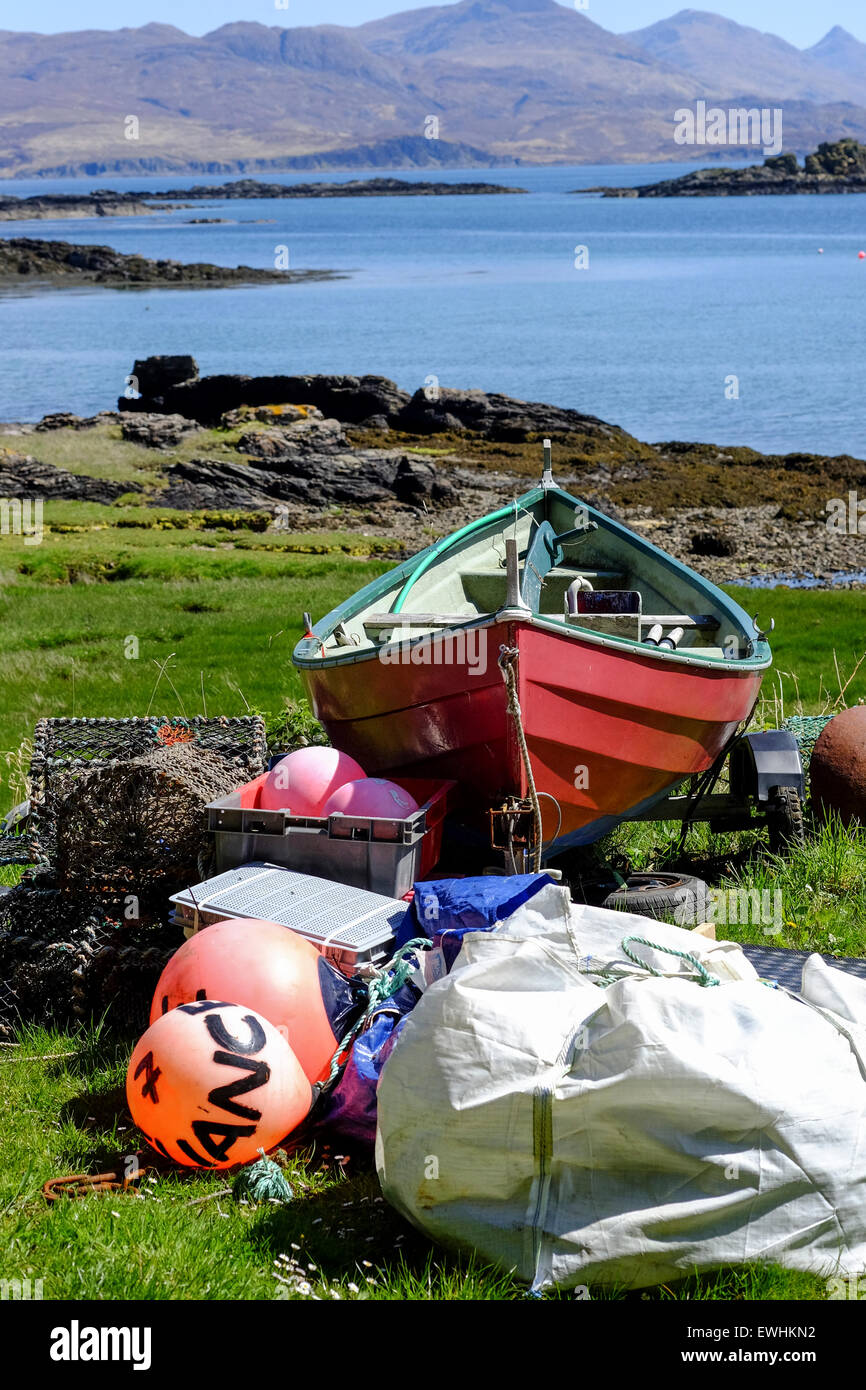Isle of Skye, Scotland. Small wooden fishing boat with fishing tackle ...
