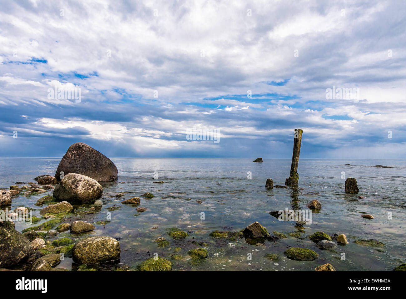 Rocks rocky shore coast sea sky hi-res stock photography and images - Alamy