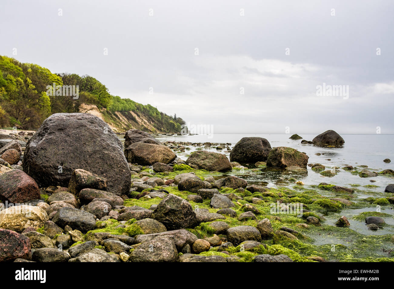 Rocks rocky shore coast sea sky hi-res stock photography and images - Alamy