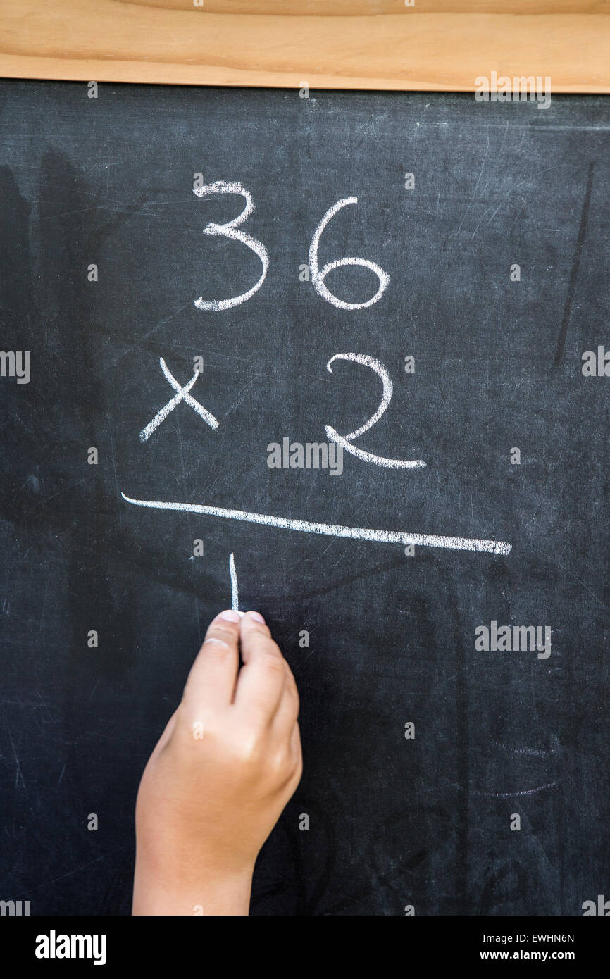 Child hand writing on blackboard with chalk Stock Photo - Alamy