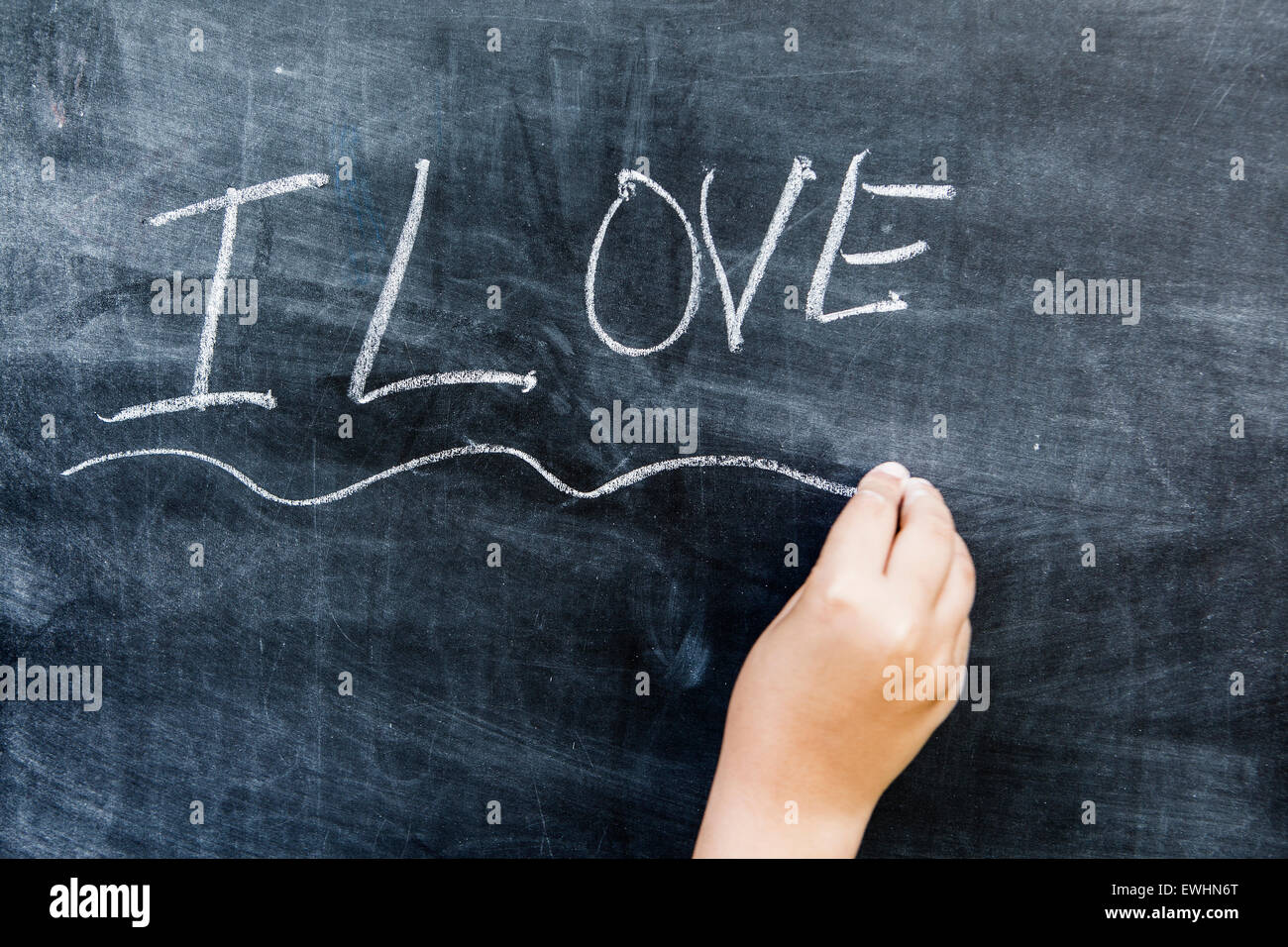 Child hand writing on blackboard with chalk Stock Photo - Alamy