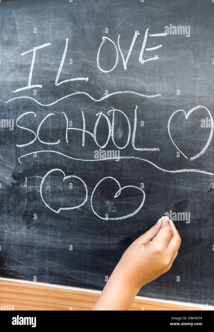 Child hand writing on blackboard with chalk Stock Photo - Alamy
