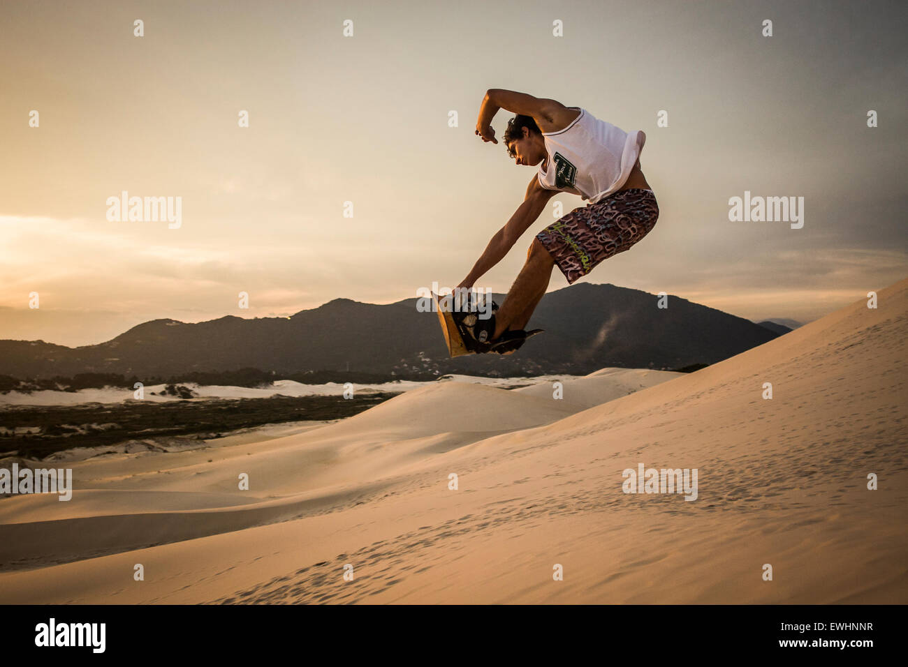 Sandboarding on the dunes of Joaquina Beach. Florianopolis, Santa ...