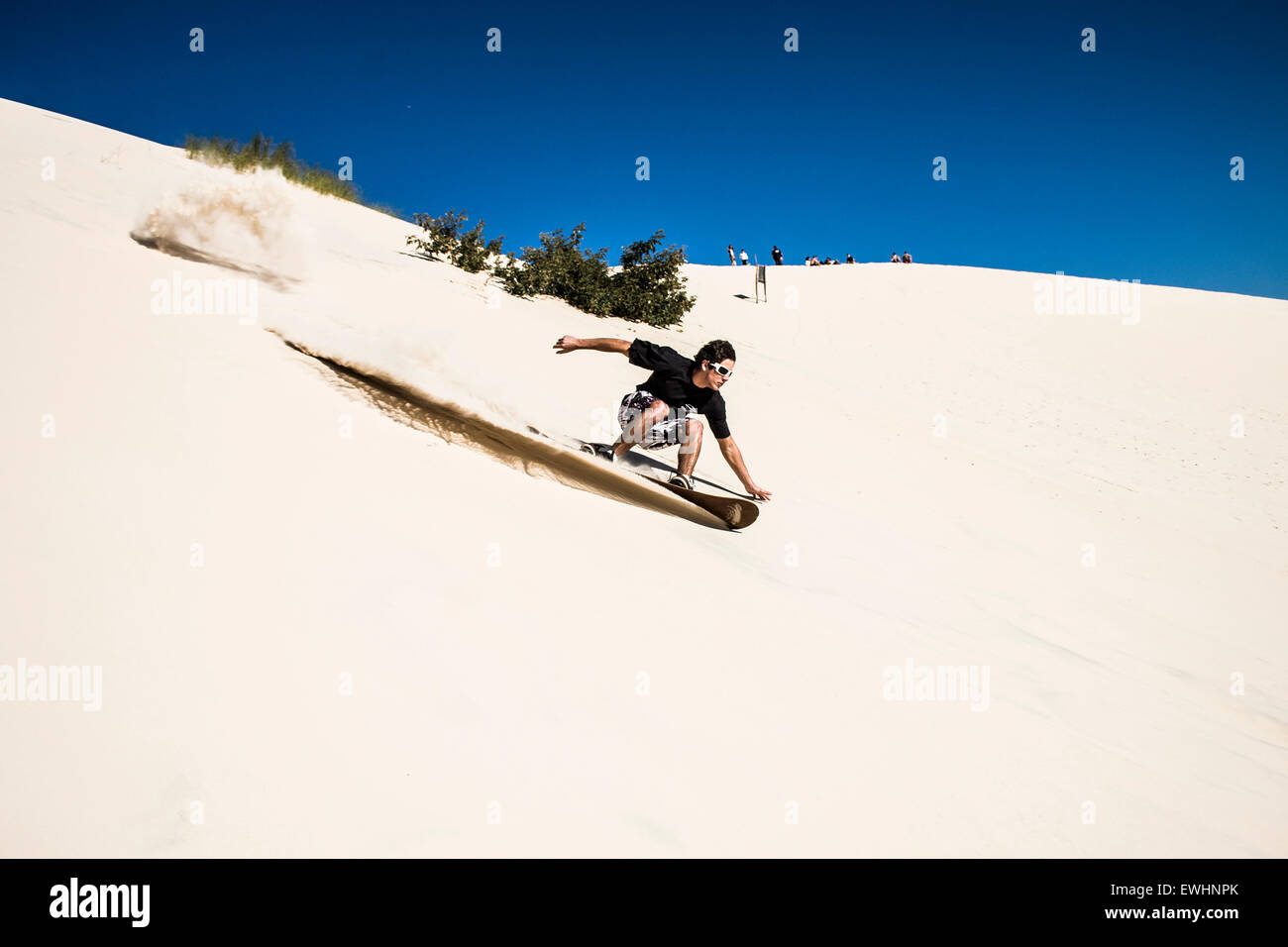 Sandboarding on the dunes of Joaquina Beach. Florianópolis, Santa ...