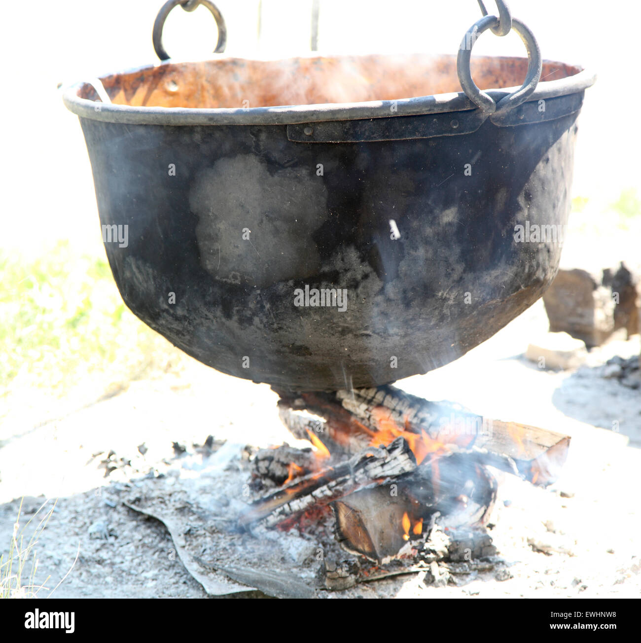 A large pot on the fire Stock Photo - Alamy