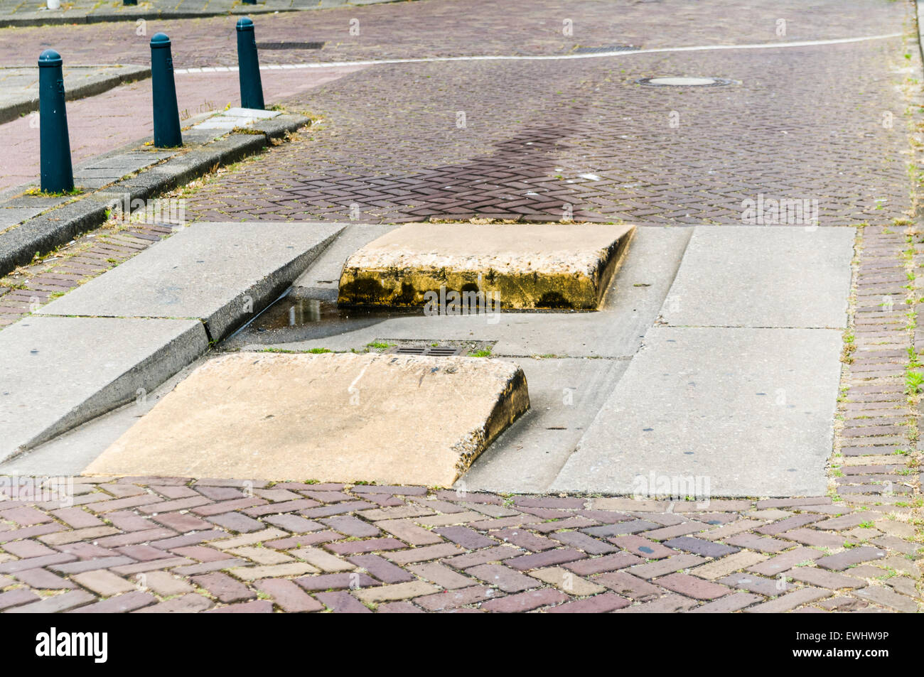 Traffic trap designed to prevent cars from entering, but allowing buses ...