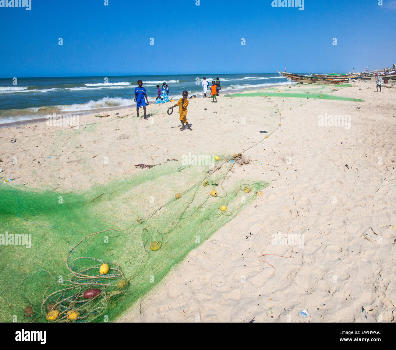 November 2012, M'bour beach, Senegal- Children playing on the sand ...