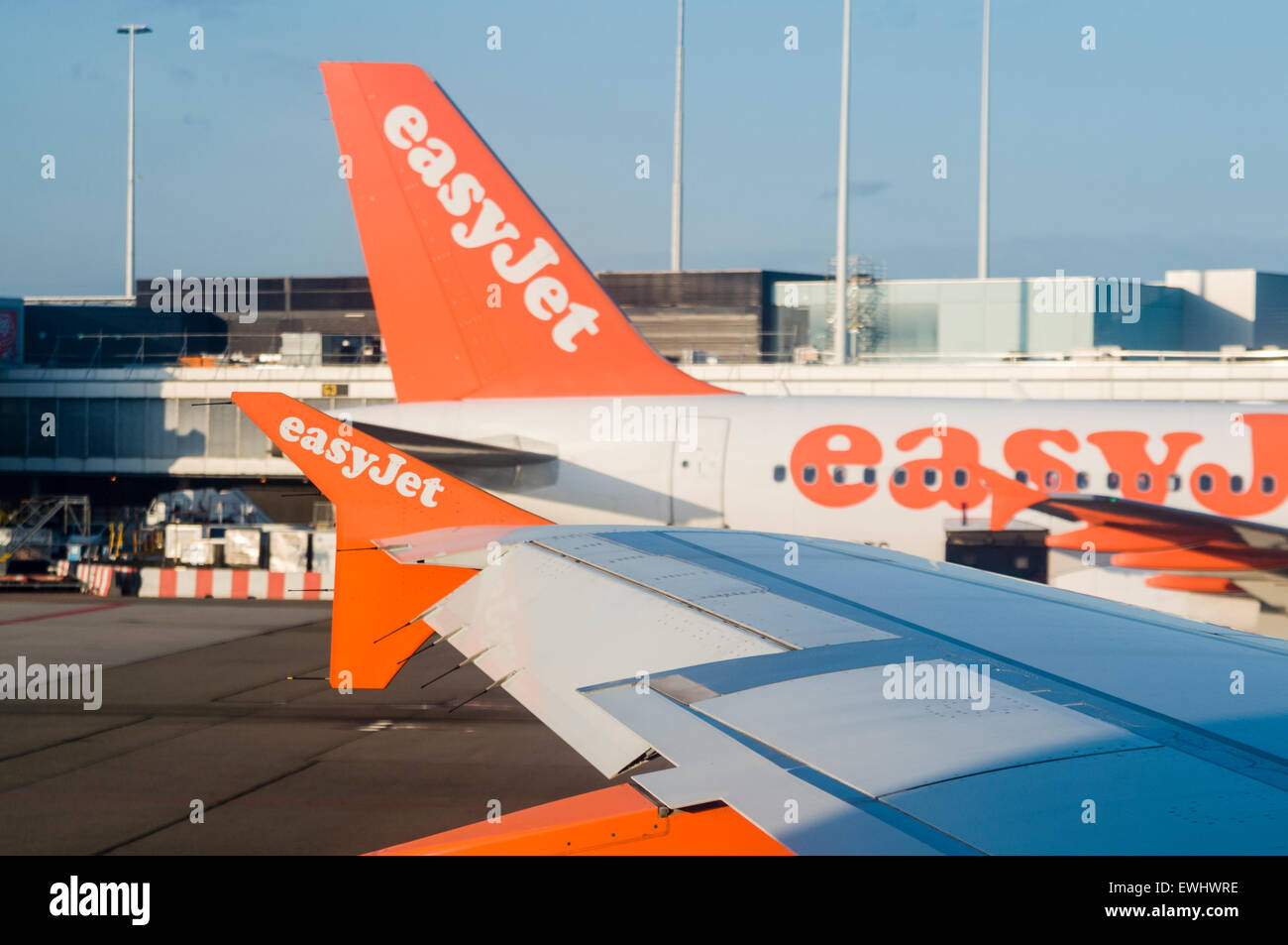 Easyjet planes sitting on the apron of an airport Stock Photo - Alamy