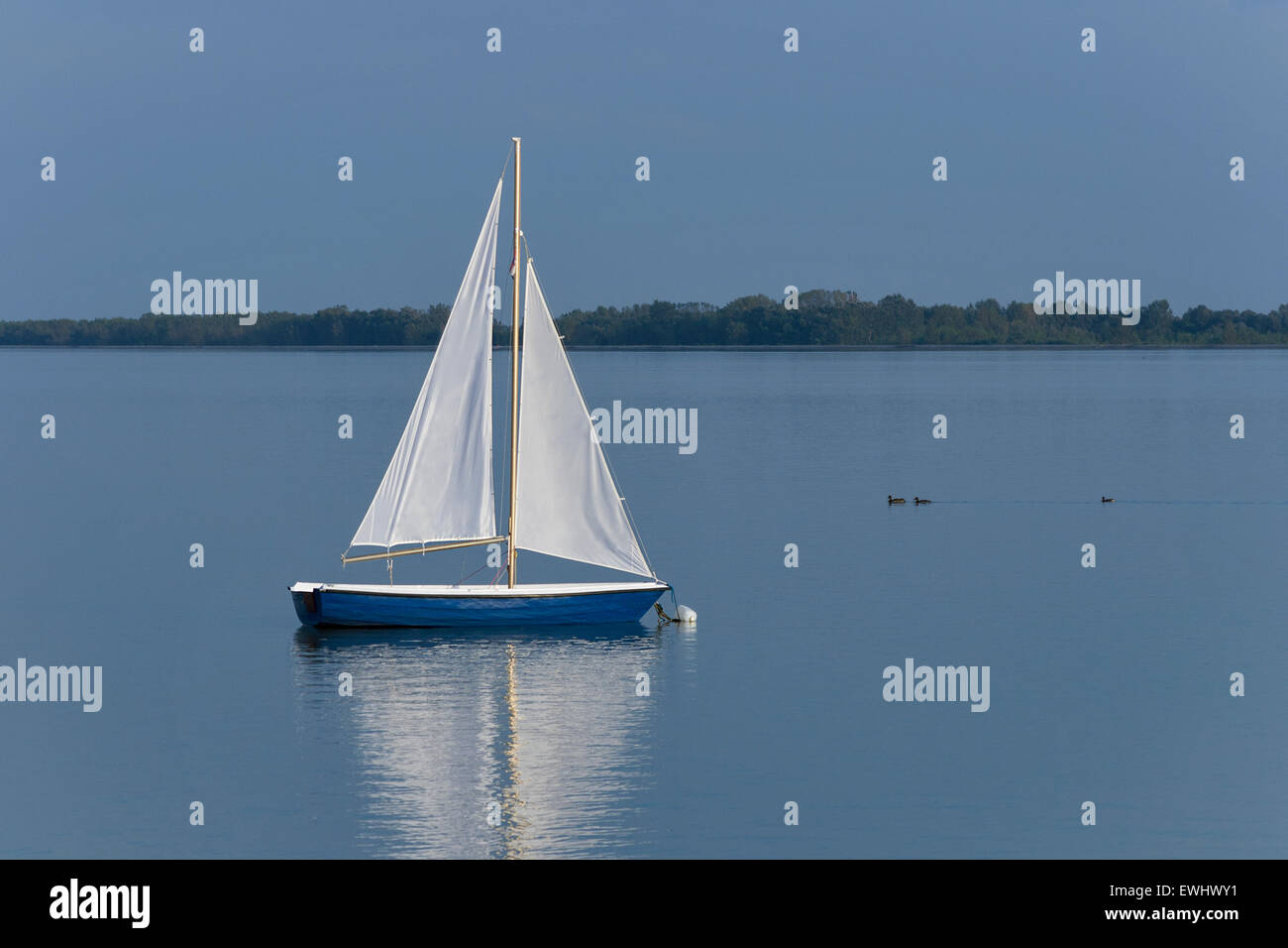 Sunset Dubrava lake reservoir landscape with sail boat in Prelog ...