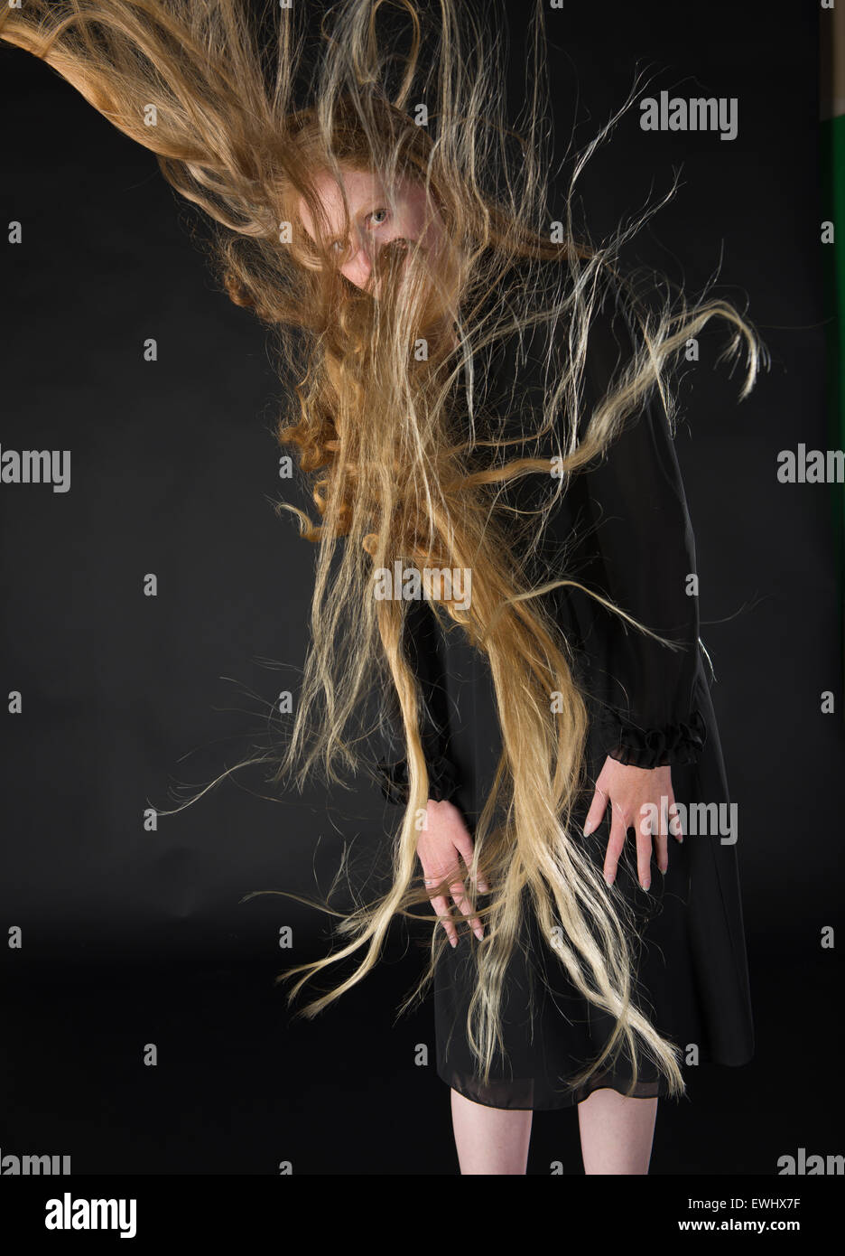 Fan blowing hair hi-res stock photography and images - Alamy