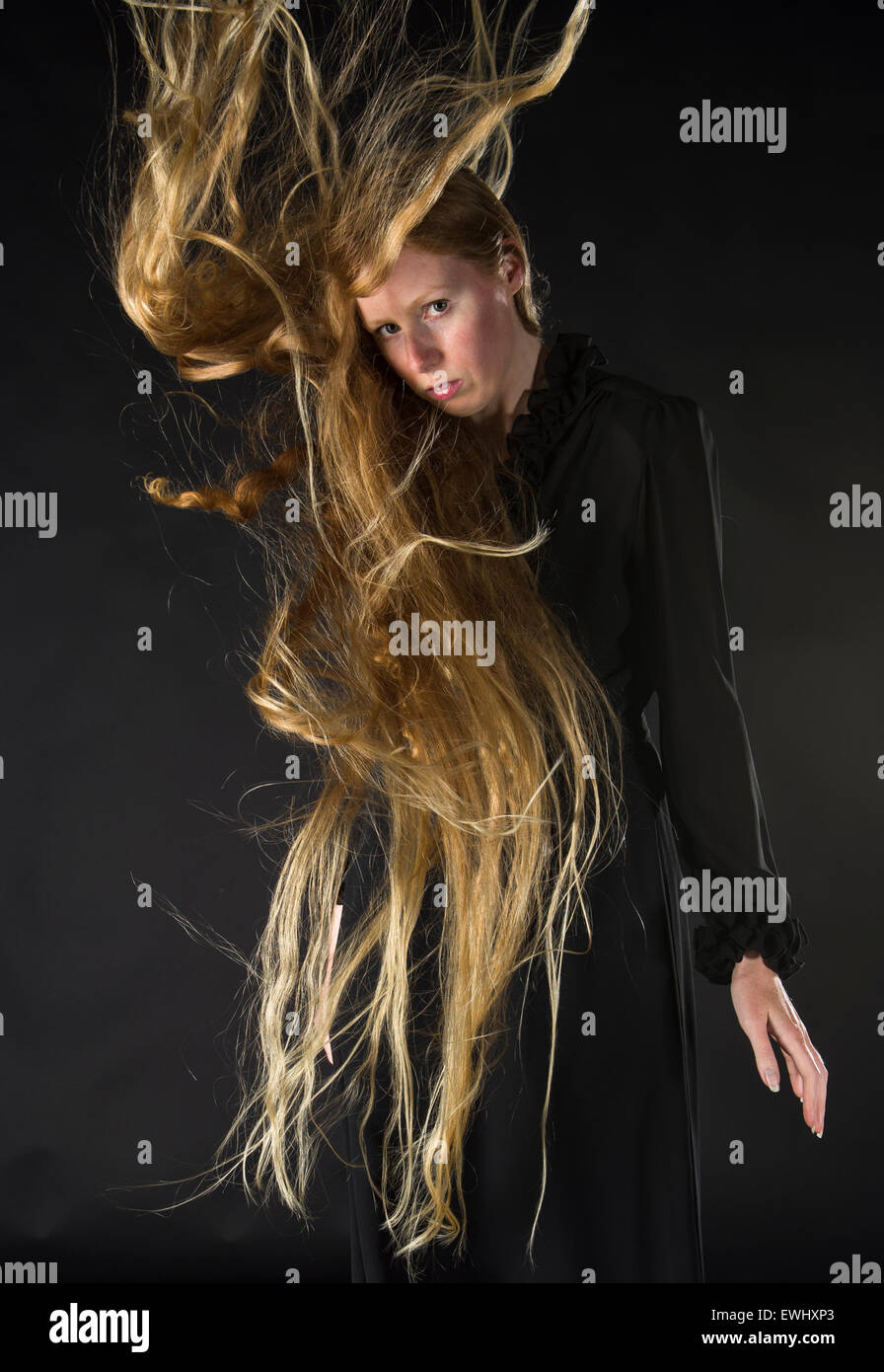 Fan blowing hair hi-res stock photography and images - Alamy