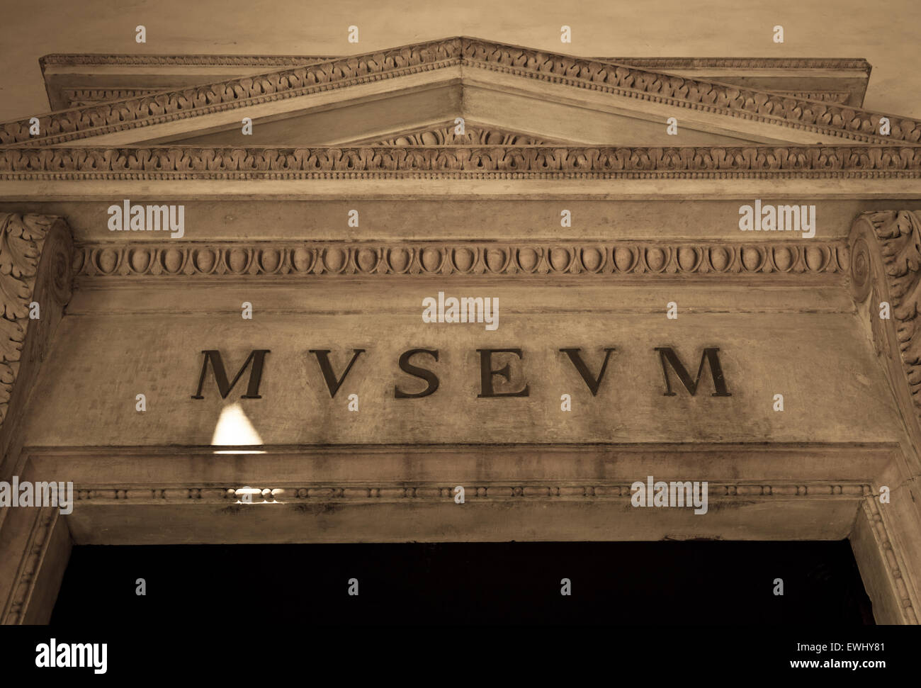Entrance of an ancient museum, letters on original marble Stock Photo ...