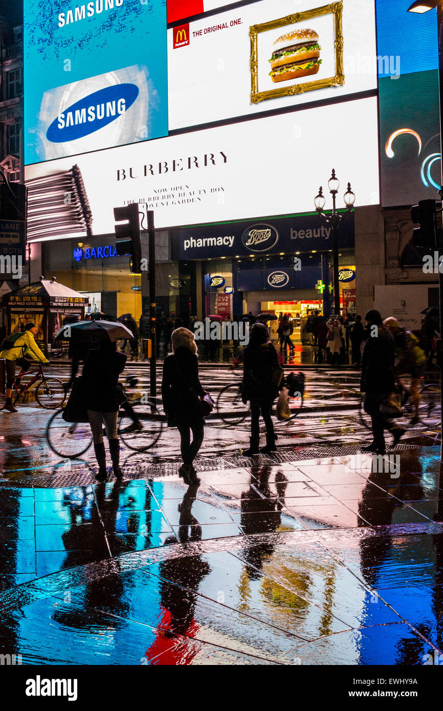 Rain reflects Piccadilly Circus lights in Central London Stock Photo ...