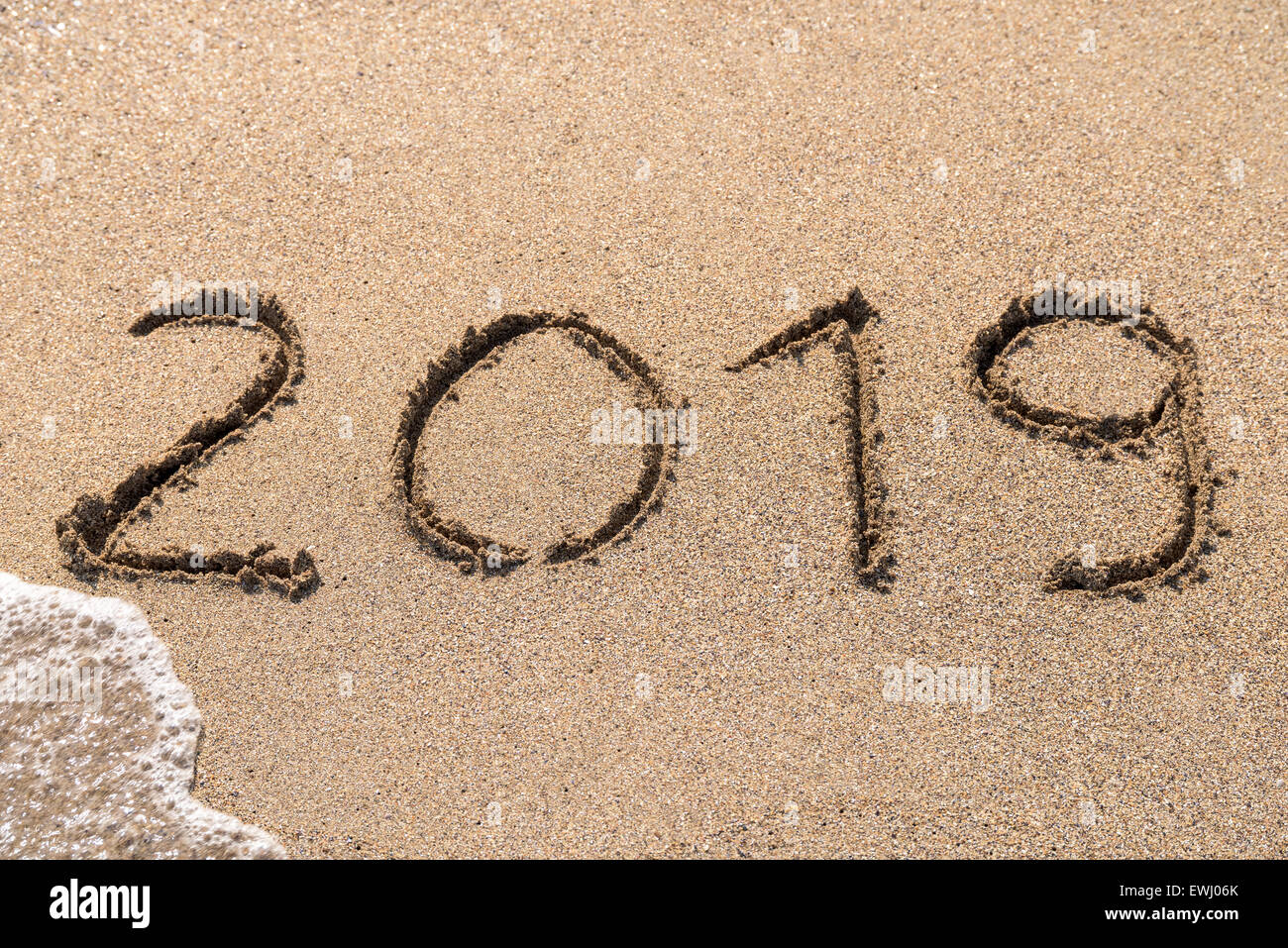 Year 2019 Written On Beach Sand Stock Photo - Alamy