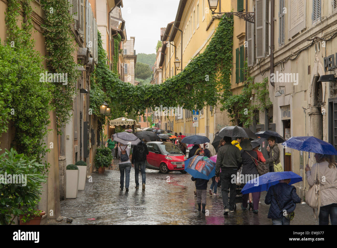 rainy streets of Rome Stock Photo - Alamy