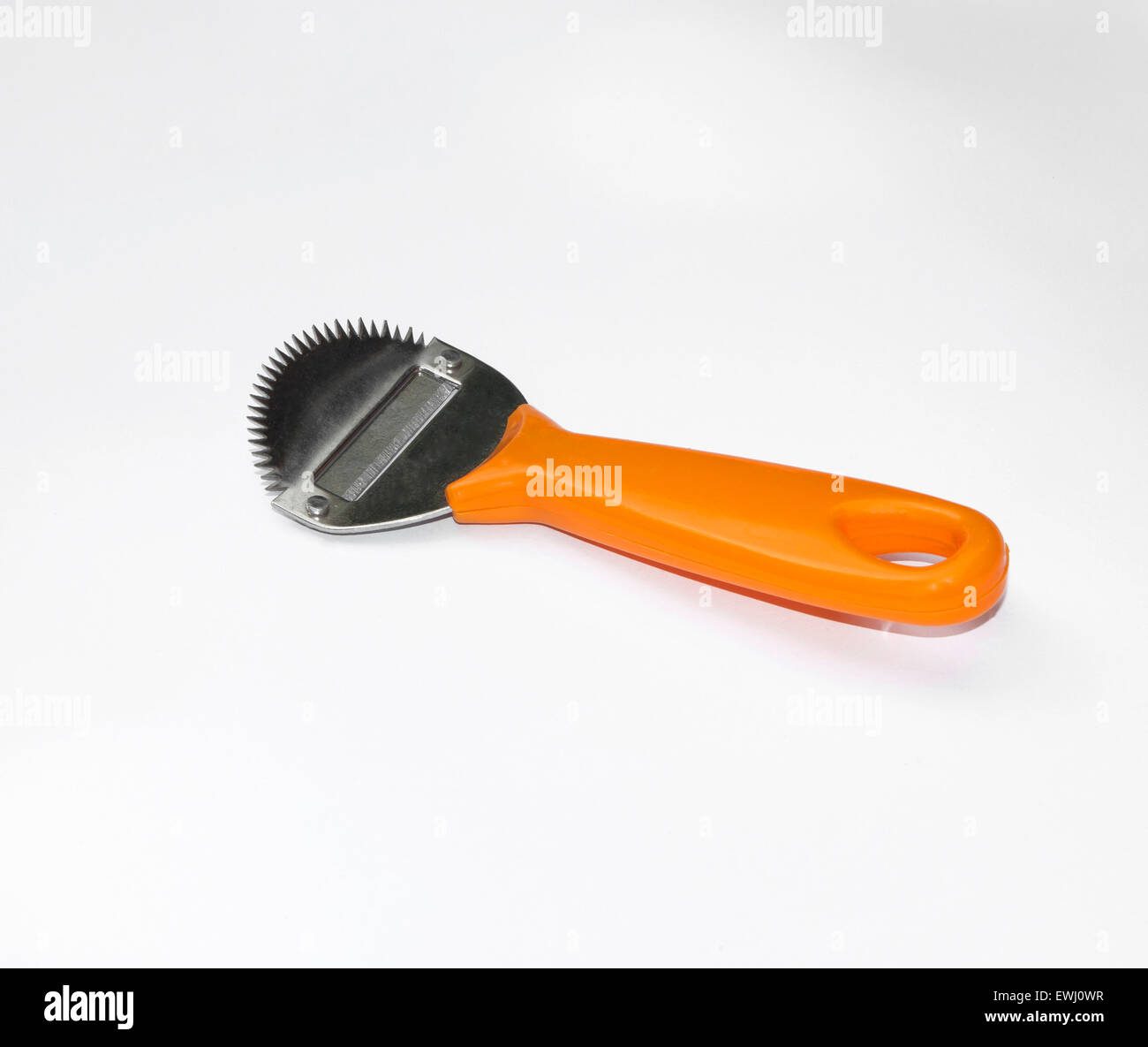 Vegetable scraper tool to households for cooking Stock Photo - Alamy