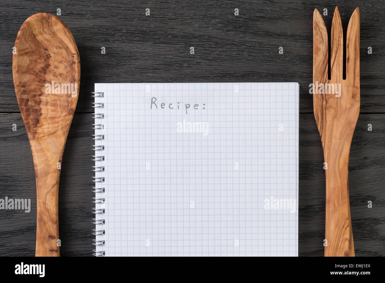 notepad with word recipe on wood table with utensils Stock Photo - Alamy