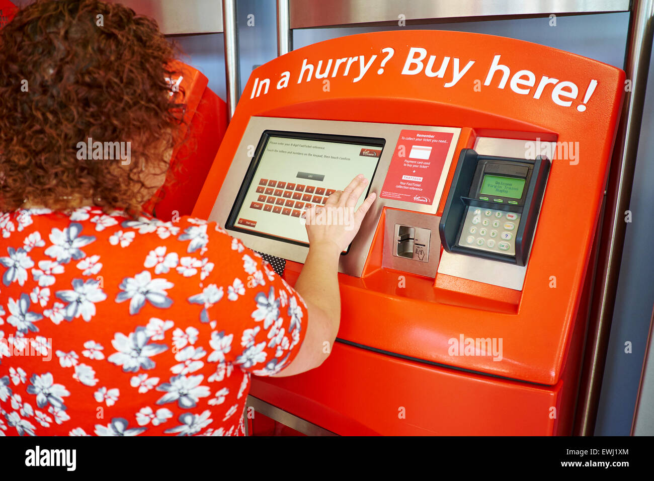 Woman train ticket machine uk hi-res stock photography and images - Alamy