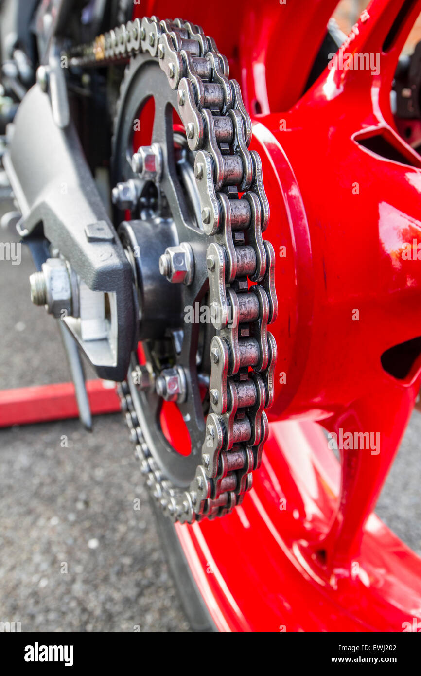 red wheeled motorcycle with greased chain Stock Photo - Alamy
