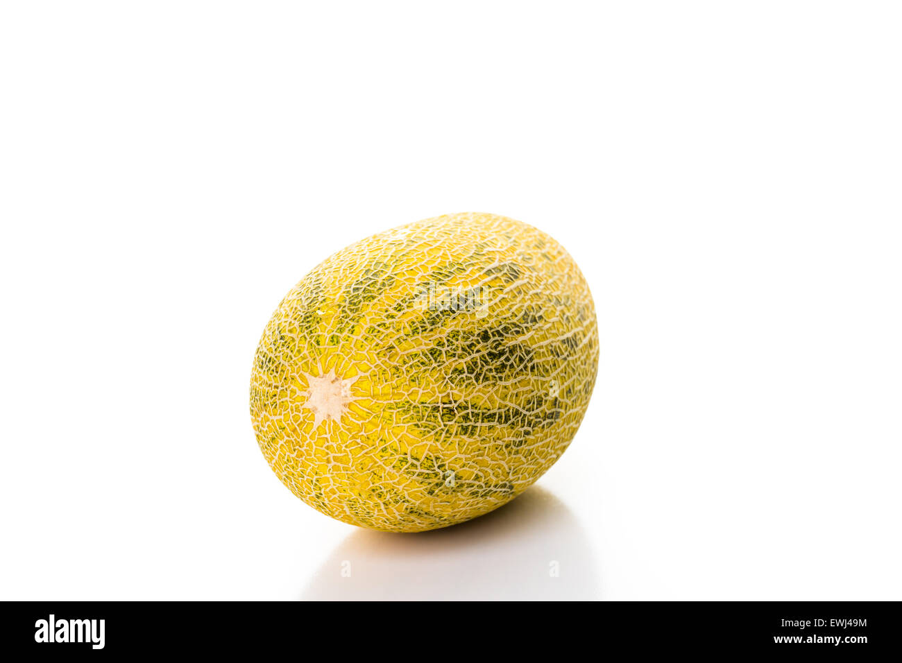 Whole organic Persian melon on a white background Stock Photo - Alamy