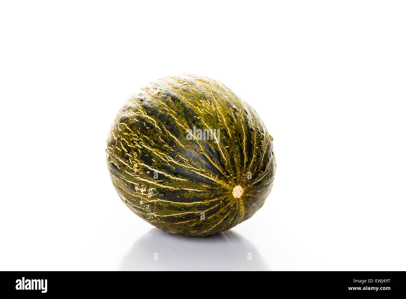 Whole organic Piel de Sapo melon on a white background Stock Photo - Alamy